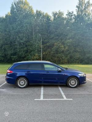 Blue Ford Mondeo 2018 in Vilnius, with an engine capacity of 2.00 L and mileage of 163 thousand km for 8700 €, photo 7 on AUTOMOTO.COM.LV