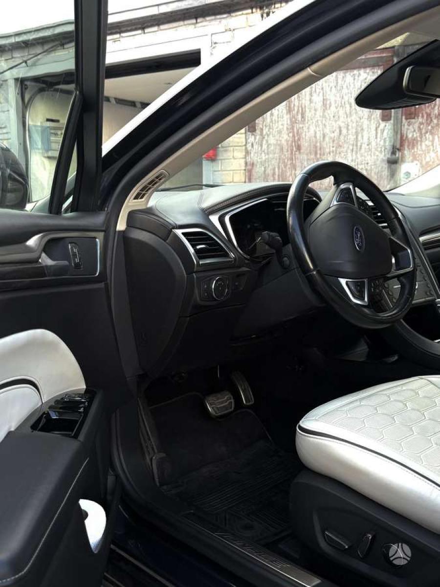 Blue Ford Mondeo 2019 in Kaunas, with an engine capacity of 2.00 L and mileage of 131 thousand km for 18100 €, photo 6 on AUTOMOTO.COM.LV