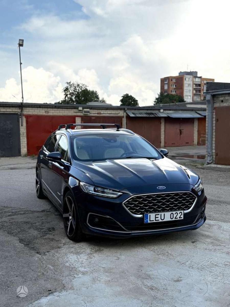 Blue Ford Mondeo 2019 in Kaunas, with an engine capacity of 2.00 L and mileage of 131 thousand km for 18100 €, photo 12 on AUTOMOTO.COM.LV