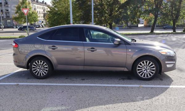 Brūns Ford Mondeo 2012 Rīga, ar dzinēja tilpumu 2.00 L un nobraukumu 231 tūkst. km par 3900 €, foto 6 vietnē AUTOMOTO.COM.LV
