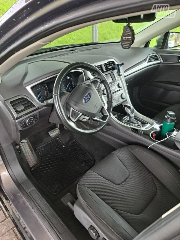 Brown Ford Mondeo 2015 in Vievis, with an engine capacity of 1.50 L and mileage of 165 thousand km for 3700 €, photo 9 on AUTOMOTO.COM.LV