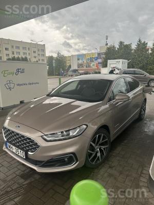 Brown Ford Mondeo 2019 in Riga, with an engine capacity of 2.00 L and mileage of 129 thousand km for 19900 €, photo  on AUTOMOTO.COM.LV