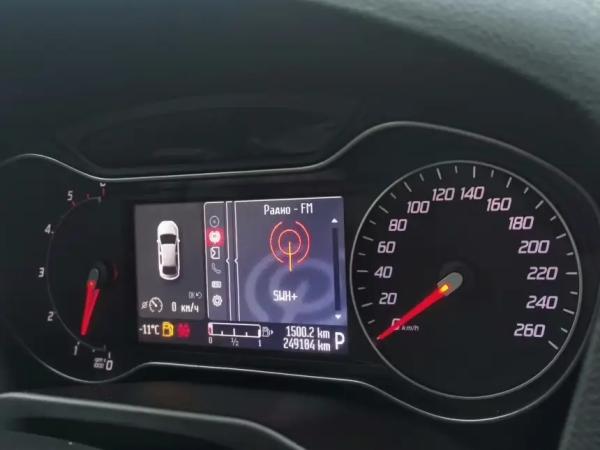 Brown Ford Mondeo 2010 in Riga, with an engine capacity of 2.00 L and mileage of 249 thousand km for 5990 €, photo 9 on AUTOMOTO.COM.LV