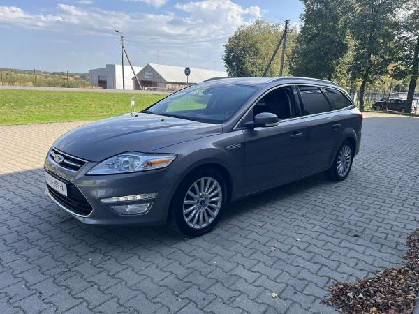 Ford Mondeo 2012 in Kaunas on AUTOMOTO.COM.LV Brown Ford Mondeo 2012 in Kaunas, with an engine capacity of 1.56 L and mileage of 237 thousand km for 4750 €, photo 4 on AUTOMOTO.COM.LV