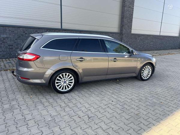 Ford Mondeo 2012 in Kaunas on AUTOMOTO.COM.LV Brown Ford Mondeo 2012 in Kaunas, with an engine capacity of 1.56 L and mileage of 237 thousand km for 4750 €, photo 10 on AUTOMOTO.COM.LV