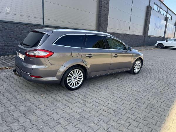Ford Mondeo 2012 in Kaunas on AUTOMOTO.COM.LV Brown Ford Mondeo 2012 in Kaunas, with an engine capacity of 1.56 L and mileage of 237 thousand km for 4750 €, photo 11 on AUTOMOTO.COM.LV