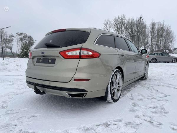 Brown Ford Mondeo 2015 in Kaunas, with an engine capacity of 2.00 L and mileage of 322 thousand km for 6500 €, photo 4 on AUTOMOTO.COM.LV