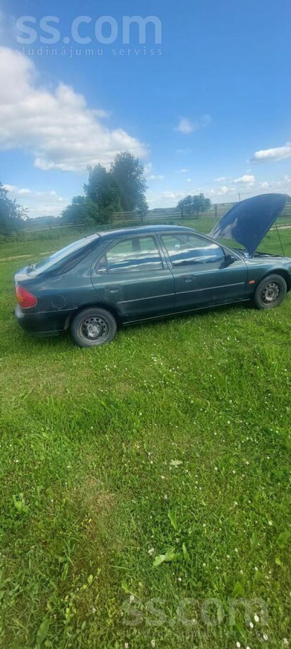 Green Ford Mondeo 1998 in Gulbene, with an engine capacity of 1.80 L and mileage of 250 thousand km for 650 €, photo 10 on AUTOMOTO.COM.LV