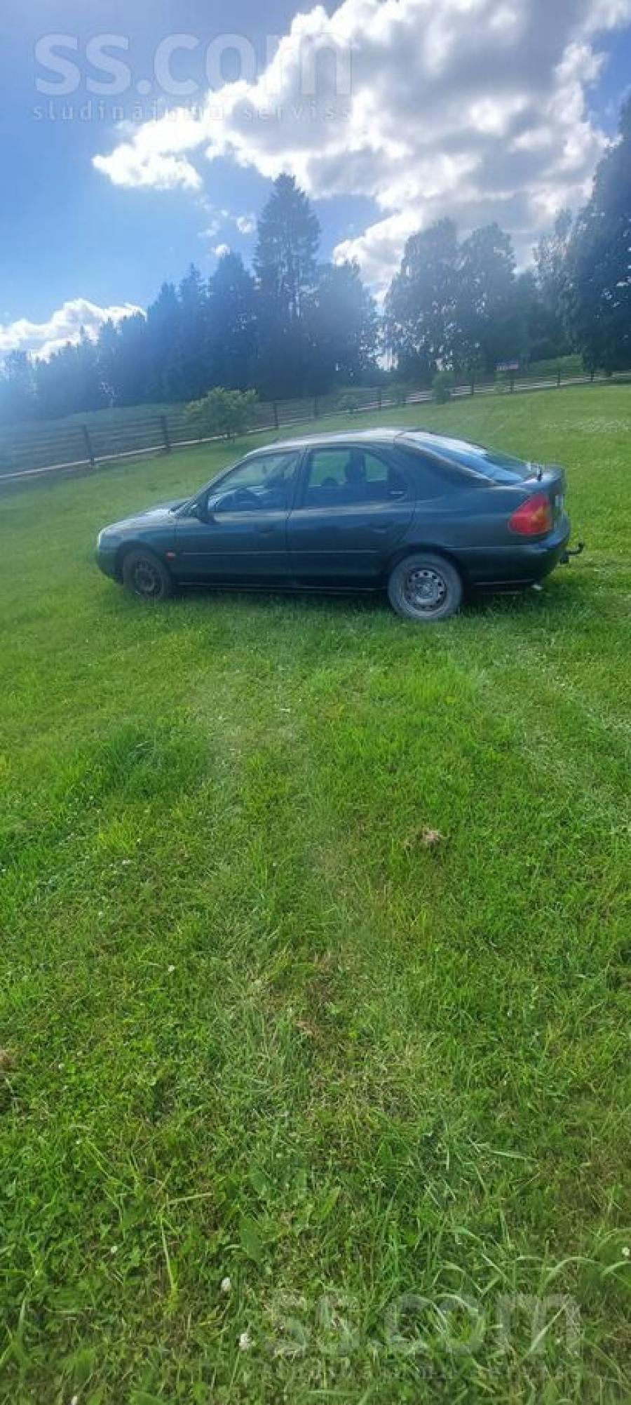 Green Ford Mondeo 1998 in Gulbene, with an engine capacity of 1.80 L and mileage of 250 thousand km for 650 €, photo 10 on AUTOMOTO.COM.LV