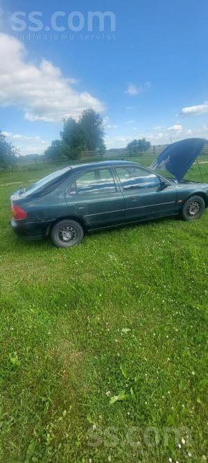 Green Ford Mondeo 1998 in Gulbene, with an engine capacity of 1.80 L and mileage of 250 thousand km for 650 €, photo 11 on AUTOMOTO.COM.LV
