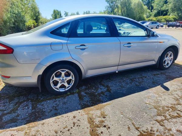 Grey Ford Mondeo 2008 in Marijampole, with an engine capacity of 1.60 L and mileage of 195 thousand km for 1199 €, photo 9 on AUTOMOTO.COM.LV