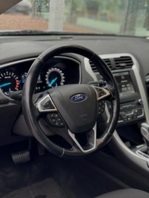Pelēks Ford Mondeo 2015 Rīga, ar dzinēja tilpumu 1.50 L un nobraukumu 121 tūkst. km par 9200 €, foto 14 vietnē AUTOMOTO.COM.LV