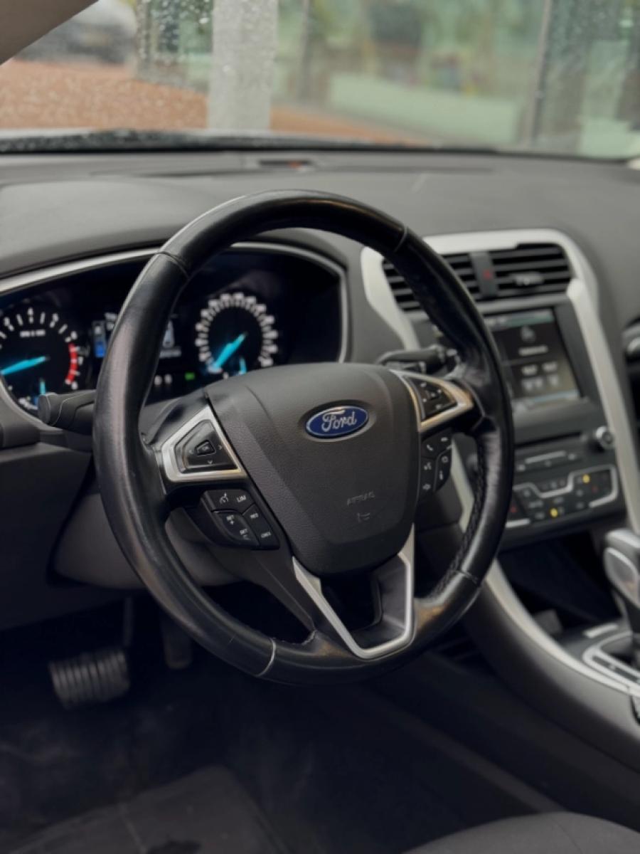 Pelēks Ford Mondeo 2015 Rīga, ar dzinēja tilpumu 1.50 L un nobraukumu 121 tūkst. km par 9200 €, foto 14 vietnē AUTOMOTO.COM.LV
