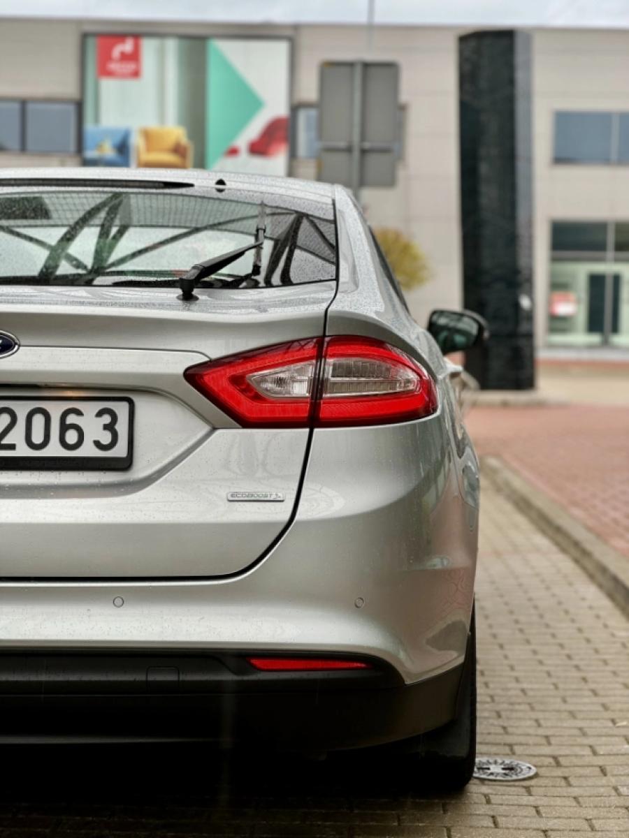 Pelēks Ford Mondeo 2015 Rīga, ar dzinēja tilpumu 1.50 L un nobraukumu 121 tūkst. km par 9200 €, foto 34 vietnē AUTOMOTO.COM.LV