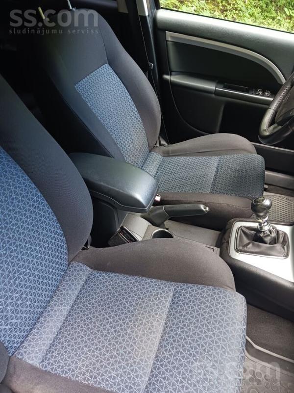 Pelēks Ford Mondeo 2006 Rīga, ar dzinēja tilpumu 2.00 L un nobraukumu 359 tūkst. km par 1000 €, foto 6 vietnē AUTOMOTO.COM.LV