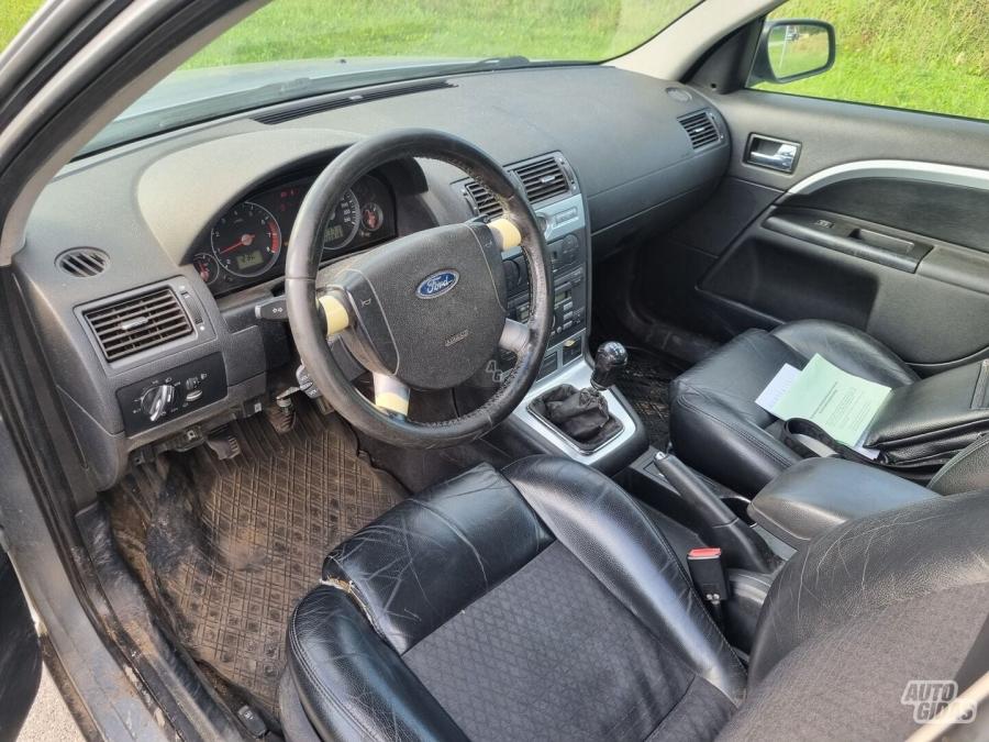 Pelēks Ford Mondeo 2006 Kauņa, ar dzinēja tilpumu 1.80 L un nobraukumu 353 tūkst. km par 850 €, foto 6 vietnē AUTOMOTO.COM.LV