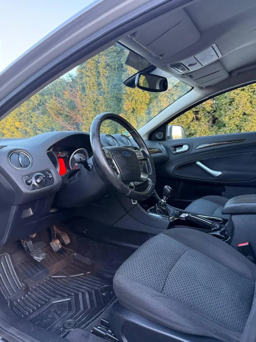 Pelēks Ford Mondeo 2008 Rīga, ar dzinēja tilpumu 2.00 L un nobraukumu 406 tūkst. km par 1750 €, foto 14 vietnē AUTOMOTO.COM.LV