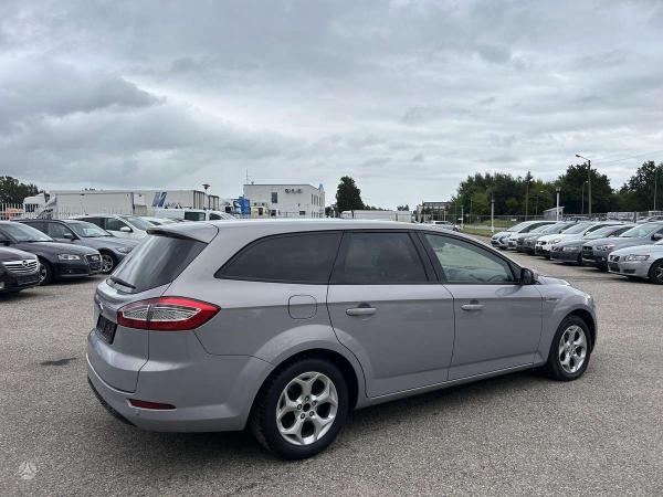 Pelēks Ford Mondeo 2014 Marijampole, ar dzinēja tilpumu 1.56 L un nobraukumu 263 tūkst. km par 3450 €, foto 5 vietnē AUTOMOTO.COM.LV