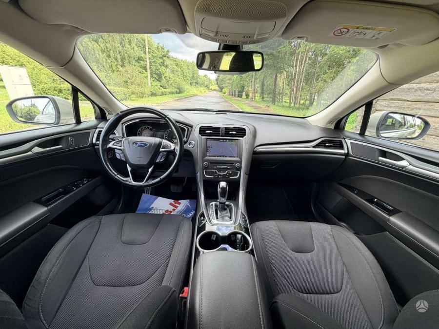Grey Ford Mondeo 2014 in Utena, with an engine capacity of 2.00 L and mileage of 335 thousand km for 6450 €, photo 18 on AUTOMOTO.COM.LV