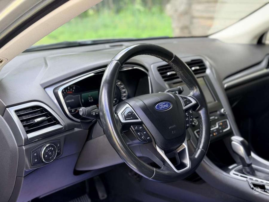 Grey Ford Mondeo 2014 in Utena, with an engine capacity of 2.00 L and mileage of 335 thousand km for 6450 €, photo 21 on AUTOMOTO.COM.LV