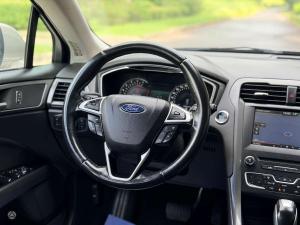 Grey Ford Mondeo 2014 in Utena, with an engine capacity of 2.00 L and mileage of 335 thousand km for 6450 €, photo 22 on AUTOMOTO.COM.LV