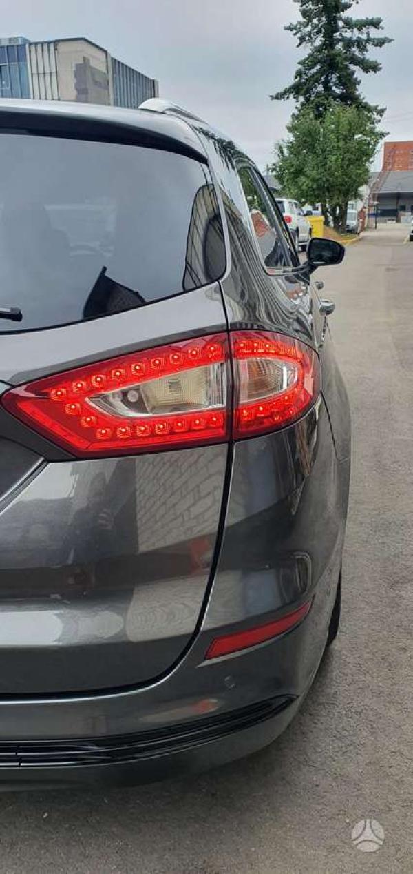 Grey Ford Mondeo 2015 in Kaunas, with an engine capacity of 1.56 L and mileage of 270 thousand km for 6750 €, photo 5 on AUTOMOTO.COM.LV
