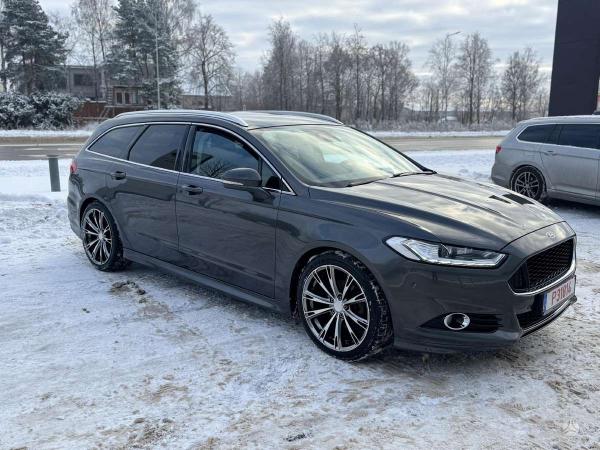 Grey Ford Mondeo 2016 in Siauliai, with an engine capacity of 2.00 L and mileage of 226 thousand km for 11500 €, photo 9 on AUTOMOTO.COM.LV