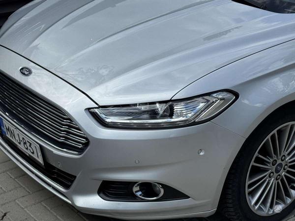 Grey Ford Mondeo 2016 in Kaunas, with an engine capacity of 2.00 L and mileage of 304 thousand km for 5490 €, photo 4 on AUTOMOTO.COM.LV