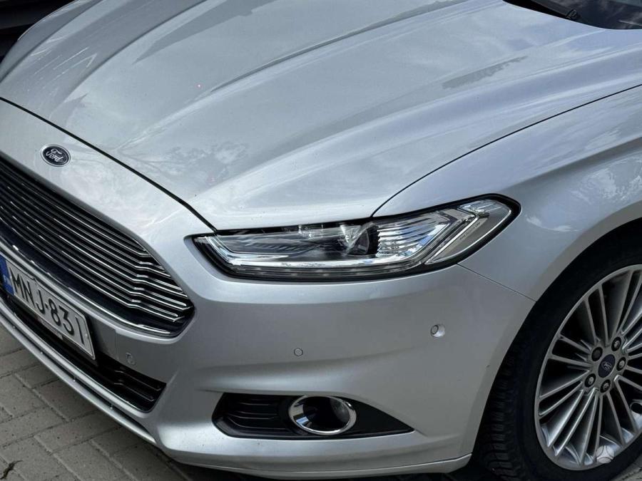 Grey Ford Mondeo 2016 in Kaunas, with an engine capacity of 2.00 L and mileage of 304 thousand km for 5490 €, photo 5 on AUTOMOTO.COM.LV