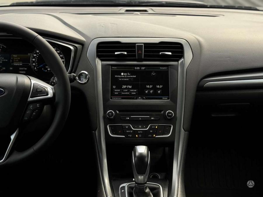 Grey Ford Mondeo 2016 in Kaunas, with an engine capacity of 2.00 L and mileage of 304 thousand km for 5490 €, photo 18 on AUTOMOTO.COM.LV