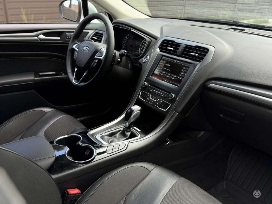 Grey Ford Mondeo 2016 in Kaunas, with an engine capacity of 2.00 L and mileage of 304 thousand km for 5490 €, photo 35 on AUTOMOTO.COM.LV