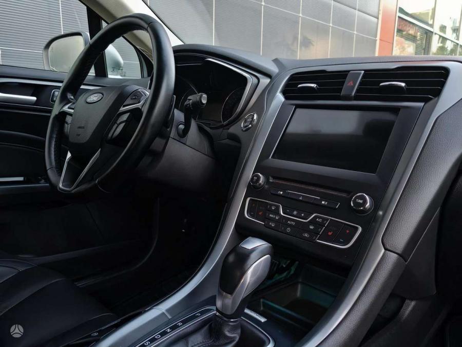 Grey Ford Mondeo 2016 in Klaipeda, with an engine capacity of 2.00 L and mileage of 290 thousand km for 7999 €, photo 41 on AUTOMOTO.COM.LV