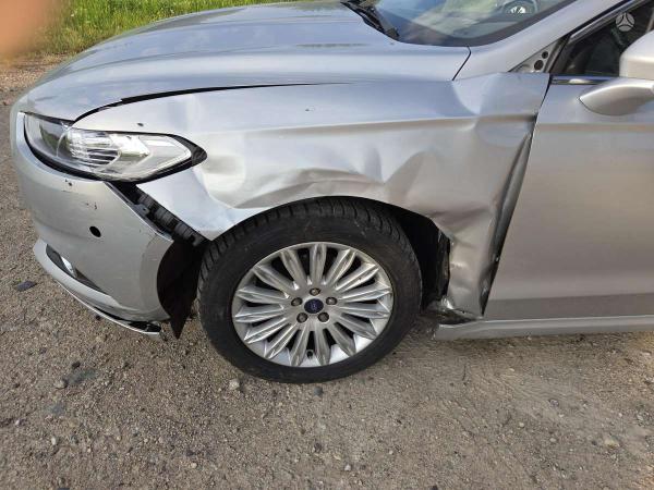 Grey Ford Mondeo 2017 in Siauliai, with an engine capacity of 2.00 L and mileage of 328 thousand km for 3980 €, photo 7 on AUTOMOTO.COM.LV