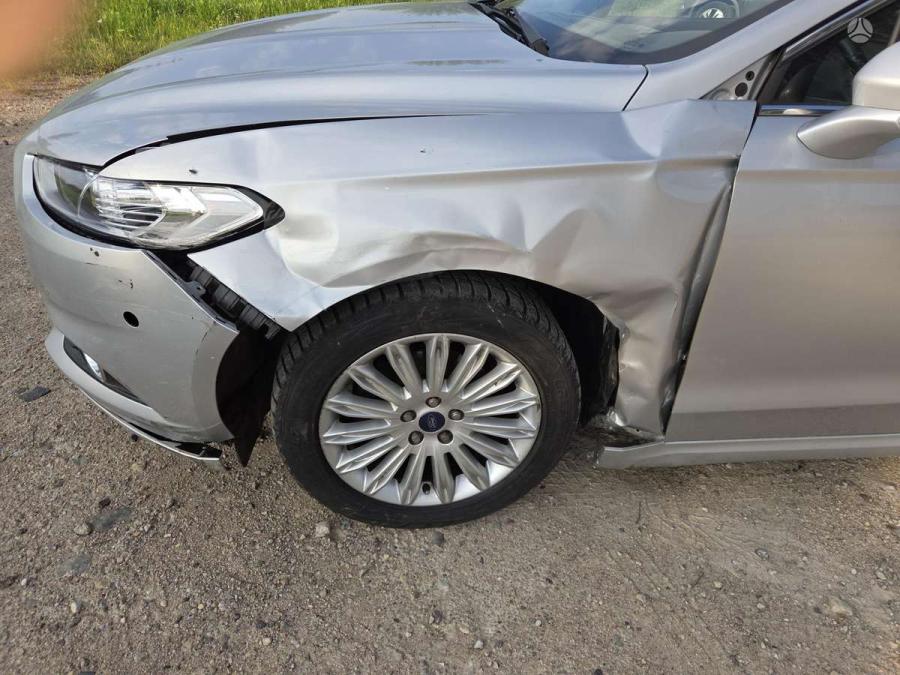 Grey Ford Mondeo 2017 in Siauliai, with an engine capacity of 2.00 L and mileage of 328 thousand km for 3980 €, photo 8 on AUTOMOTO.COM.LV