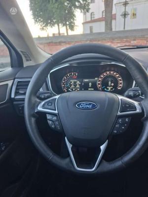 Grey Ford Mondeo 2017 in Raseiniai, with an engine capacity of 2.00 L and mileage of 248 thousand km for 6900 €, photo 20 on AUTOMOTO.COM.LV