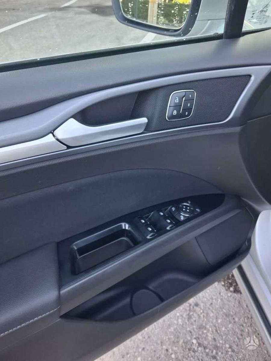 Grey Ford Mondeo 2017 in Raseiniai, with an engine capacity of 2.00 L and mileage of 248 thousand km for 6900 €, photo 30 on AUTOMOTO.COM.LV