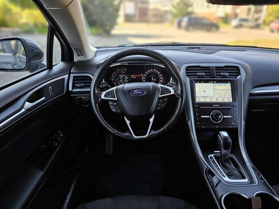 Grey Ford Mondeo 2017 in Rokiskis, with an engine capacity of 2.00 L and mileage of 220 thousand km for 6950 €, photo 23 on AUTOMOTO.COM.LV
