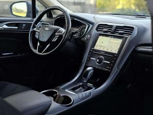 Grey Ford Mondeo 2017 in Rokiskis, with an engine capacity of 2.00 L and mileage of 220 thousand km for 6950 €, photo 28 on AUTOMOTO.COM.LV