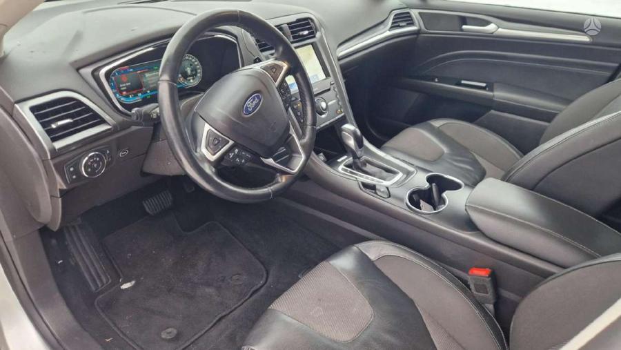 Grey Ford Mondeo 2018 in Siauliai, with an engine capacity of 2.00 L and mileage of 240 thousand km for 10300 €, photo 9 on AUTOMOTO.COM.LV
