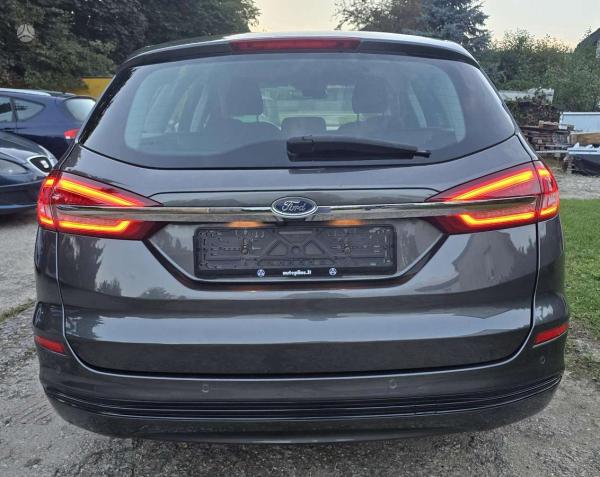 Ford Mondeo 2019 in Kaunas on AUTOMOTO.COM.LV Grey Ford Mondeo 2019 in Kaunas, with an engine capacity of 1.50 L and mileage of 148 thousand km for 8999 €, photo 7 on AUTOMOTO.COM.LV
