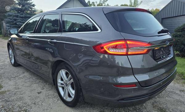 Ford Mondeo 2019 in Kaunas on AUTOMOTO.COM.LV Grey Ford Mondeo 2019 in Kaunas, with an engine capacity of 1.50 L and mileage of 148 thousand km for 8999 €, photo 8 on AUTOMOTO.COM.LV