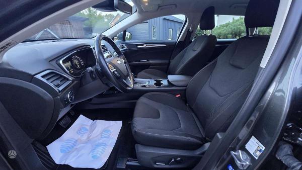 Ford Mondeo 2019 in Kaunas on AUTOMOTO.COM.LV Grey Ford Mondeo 2019 in Kaunas, with an engine capacity of 1.50 L and mileage of 148 thousand km for 8999 €, photo 9 on AUTOMOTO.COM.LV