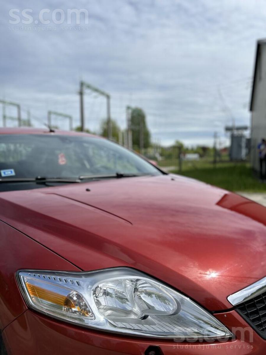 Orange Ford Mondeo 2007 in Ogre, with an engine capacity of 2.00 L and mileage of 228 thousand km for 1200 €, photo 13 on AUTOMOTO.COM.LV