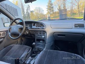 Sarkans Ford Mondeo 1994 Rapla, ar dzinēja tilpumu 1.80 L un nobraukumu 201 tūkst. km par 1200 €, foto 16 vietnē AUTOMOTO.COM.LV