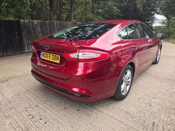 Ford Mondeo 2016 in Siauliai on AUTOMOTO.COM.LV Red Ford Mondeo 2016 in Siauliai, with an engine capacity of 2.00 L and mileage of 200 thousand km for 2595 €, photo 5 on AUTOMOTO.COM.LV