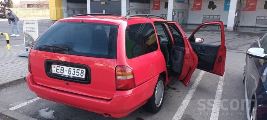 Red Ford Mondeo 1996 in Riga, with an engine capacity of 1.80 L and mileage of 199 thousand km for 1200 €, photo 4 on AUTOMOTO.COM.LV