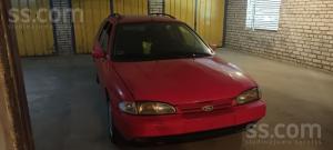 Red Ford Mondeo 1996 in Riga, with an engine capacity of 1.80 L and mileage of 199 thousand km for 1200 €, photo 15 on AUTOMOTO.COM.LV