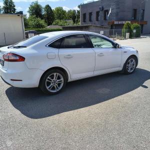 White Ford Mondeo 2013 in Kaunas, with an engine capacity of 2.00 L and mileage of 224 thousand km for 2900 €, photo 8 on AUTOMOTO.COM.LV