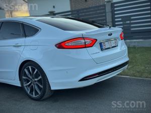 White Ford Mondeo 2015 in Jelgava, with an engine capacity of 2.00 L and mileage of 262 thousand km for 8650 €, photo 5 on AUTOMOTO.COM.LV