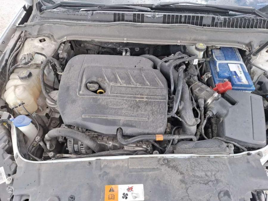 White Ford Mondeo 2015 in Panevezys, with an engine capacity of 1.50 L and mileage of 109 thousand km for 2500 €, photo 12 on AUTOMOTO.COM.LV